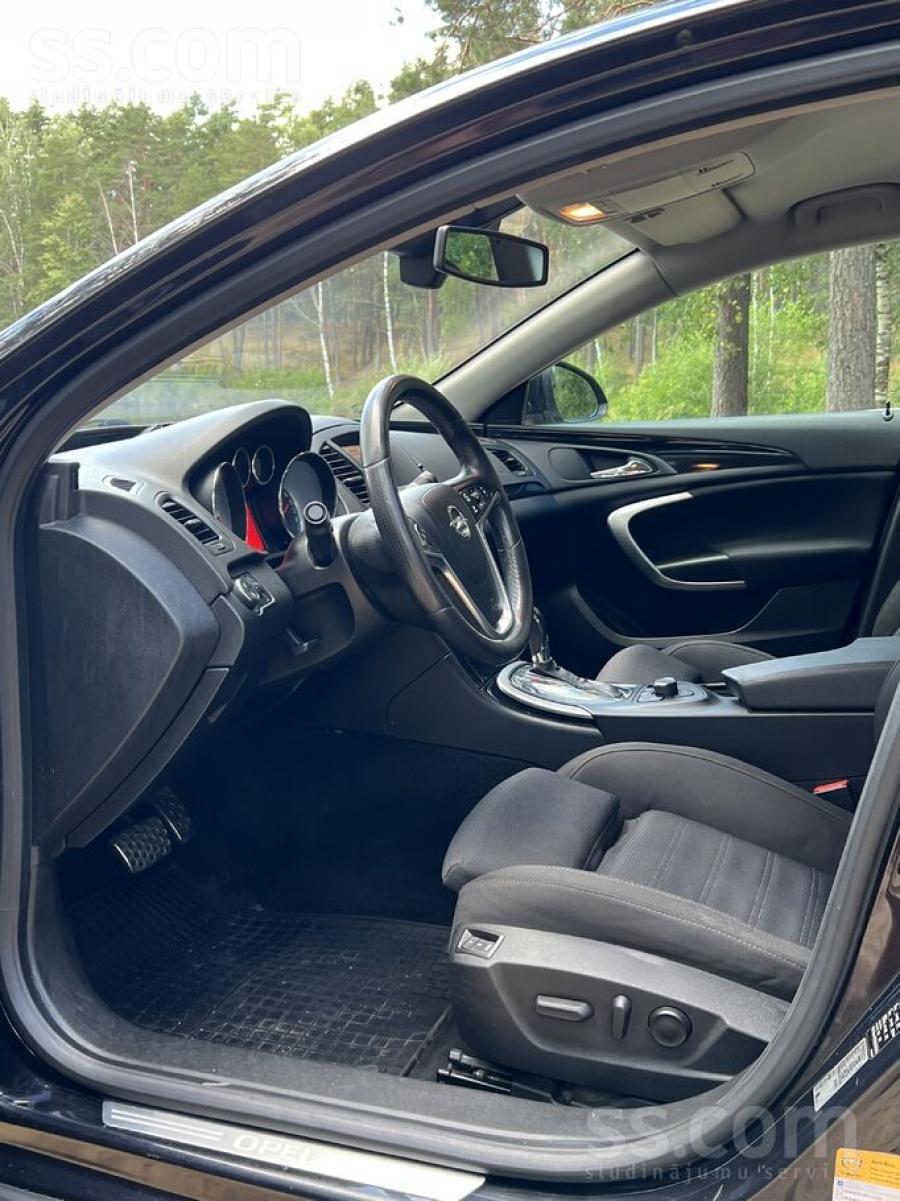 Melns Opel Insignia 2009 Rīga, ar dzinēja tilpumu 2.00 L un nobraukumu 281 tūkst. km par 2250 €, foto 7 vietnē AUTOMOTO.COM.LV