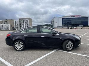 Black Opel Insignia 2009 in Vilnius, with an engine capacity of 1.96 L and mileage of 283 thousand km for 2300 €, photo  on AUTOMOTO.COM.LV