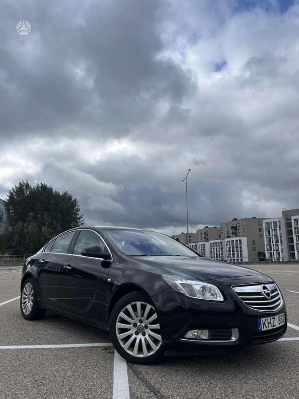 Black Opel Insignia 2009 in Vilnius, with an engine capacity of 1.96 L and mileage of 283 thousand km for 2300 €, photo 3 on AUTOMOTO.COM.LV