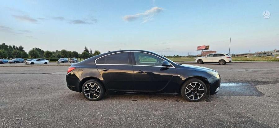 Black Opel Insignia 2009 in Kaunas, with an engine capacity of 1.80 L and mileage of 280 thousand km for 2600 €, photo 12 on AUTOMOTO.COM.LV