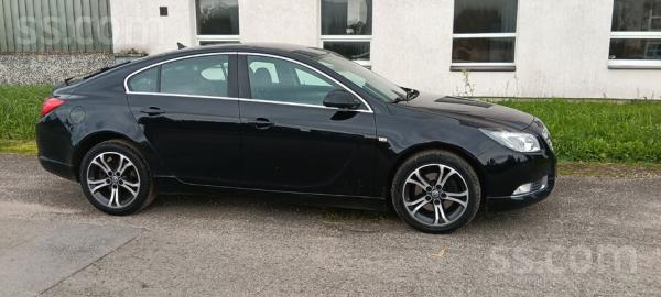 Black Opel Insignia 2009 in Jelgava, with an engine capacity of 2.00 L and mileage of 0 thousand km for 2650 €, photo 8 on AUTOMOTO.COM.LV