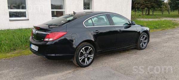 Black Opel Insignia 2009 in Jelgava, with an engine capacity of 2.00 L and mileage of 0 thousand km for 2650 €, photo 9 on AUTOMOTO.COM.LV
