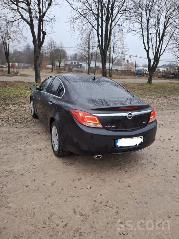 Melns Opel Insignia 2010 Rīga, ar dzinēja tilpumu 2.00 L un nobraukumu 314 tūkst. km par 3900 €, foto 3 vietnē AUTOMOTO.COM.LV
