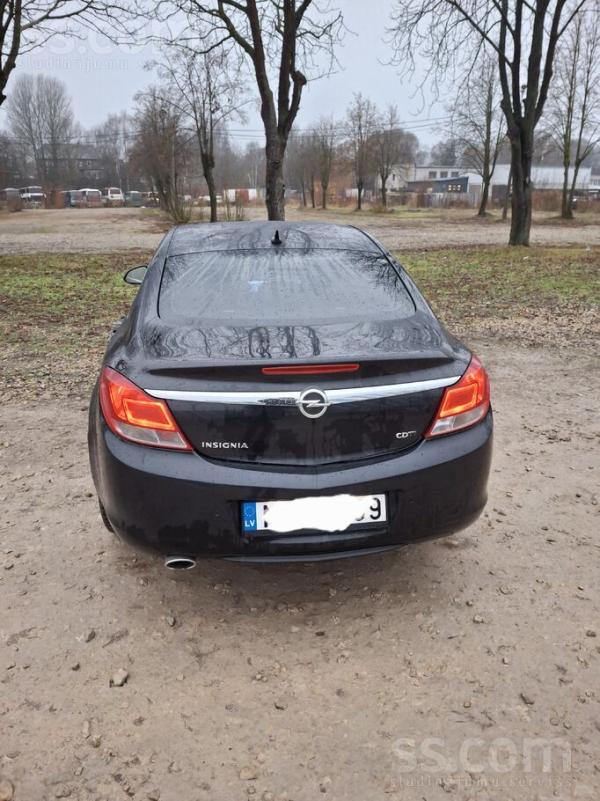 Melns Opel Insignia 2010 Rīga, ar dzinēja tilpumu 2.00 L un nobraukumu 314 tūkst. km par 3900 €, foto 4 vietnē AUTOMOTO.COM.LV