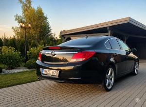 Black Opel Insignia 2010 in Klaipeda, with an engine capacity of 1.96 L and mileage of 288 thousand km for 5000 €, photo 4 on AUTOMOTO.COM.LV
