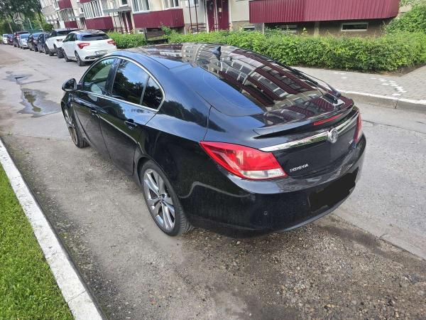 Black Opel Insignia 2011 in Siauliai, with an engine capacity of 2.00 L and mileage of 122 thousand km for 1500 €, photo 3 on AUTOMOTO.COM.LV