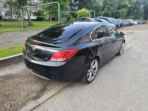Black Opel Insignia 2011 in Siauliai, with an engine capacity of 2.00 L and mileage of 122 thousand km for 1500 €, photo 4 on AUTOMOTO.COM.LV