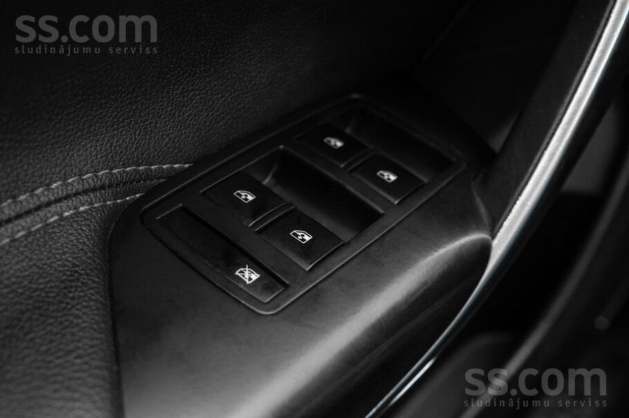 Black Opel Insignia 2011 in Riga, with an engine capacity of 2.00 L and mileage of 328 thousand km for 3250 €, photo 29 on AUTOMOTO.COM.LV