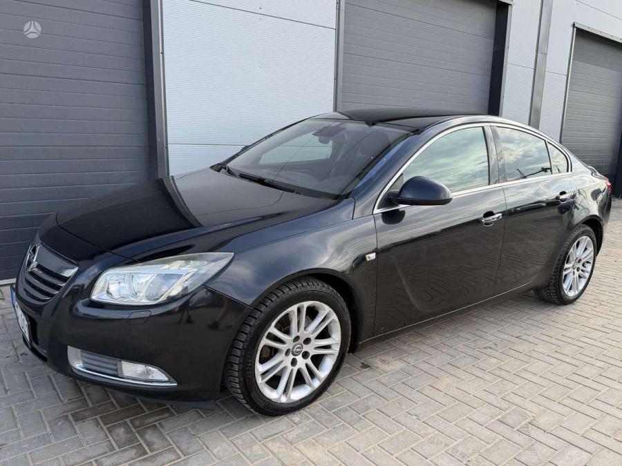 Black Opel Insignia 2011 in Vilnius, with an engine capacity of 1.96 L and mileage of 187 thousand km for 1850 €, photo 1 on AUTOMOTO.COM.LV