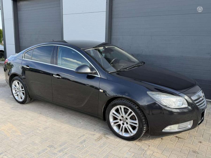 Black Opel Insignia 2011 in Vilnius, with an engine capacity of 1.96 L and mileage of 187 thousand km for 1850 €, photo 6 on AUTOMOTO.COM.LV