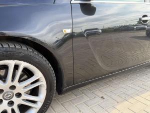 Black Opel Insignia 2011 in Vilnius, with an engine capacity of 1.96 L and mileage of 187 thousand km for 1850 €, photo 12 on AUTOMOTO.COM.LV