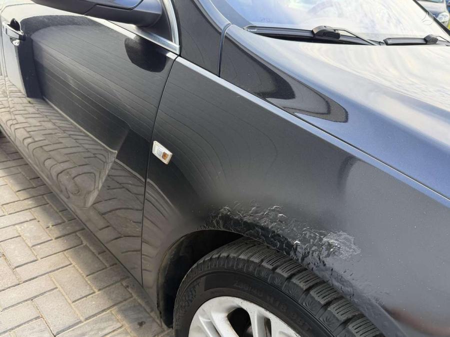 Black Opel Insignia 2011 in Vilnius, with an engine capacity of 1.96 L and mileage of 187 thousand km for 1850 €, photo 13 on AUTOMOTO.COM.LV