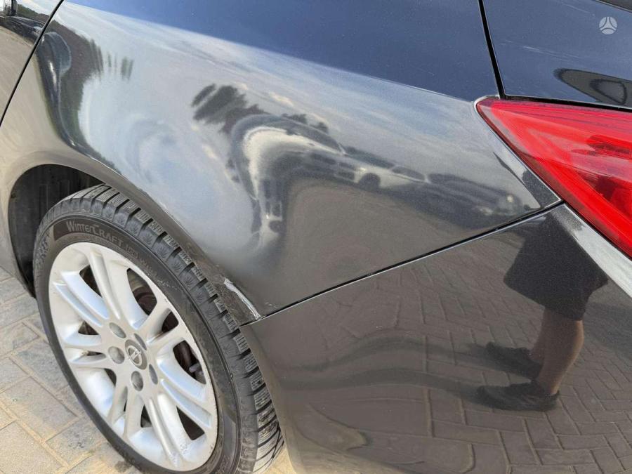 Black Opel Insignia 2011 in Vilnius, with an engine capacity of 1.96 L and mileage of 187 thousand km for 1850 €, photo 14 on AUTOMOTO.COM.LV