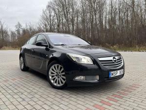 Black Opel Insignia 2011 in Mazeikiai, with an engine capacity of 1.96 L and mileage of 263 thousand km for 4499 €, photo 5 on AUTOMOTO.COM.LV