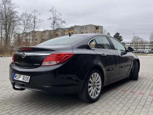 Black Opel Insignia 2011 in Mazeikiai, with an engine capacity of 1.96 L and mileage of 263 thousand km for 4499 €, photo 7 on AUTOMOTO.COM.LV