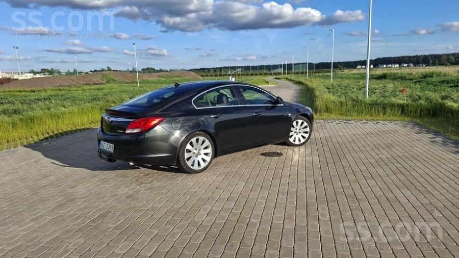 Melns Opel Insignia 2012 Rīga, ar dzinēja tilpumu 2.00 L un nobraukumu 264 tūkst. km par 3700 €, foto 5 vietnē AUTOMOTO.COM.LV