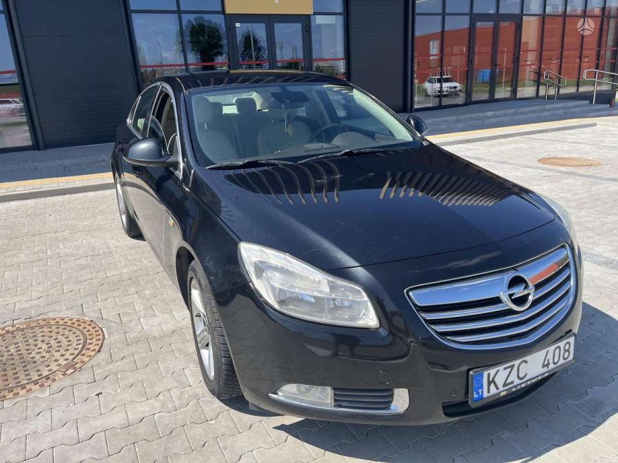 Black Opel Insignia 2012 in Kaunas, with an engine capacity of 2.00 L and mileage of 300 thousand km for 2990 €, photo 4 on AUTOMOTO.COM.LV