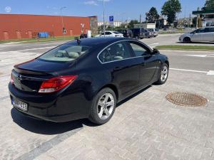Black Opel Insignia 2012 in Kaunas, with an engine capacity of 2.00 L and mileage of 300 thousand km for 2990 €, photo 5 on AUTOMOTO.COM.LV