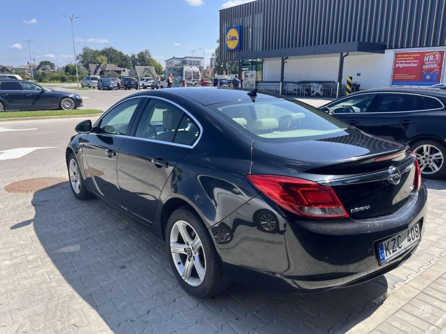 Black Opel Insignia 2012 in Kaunas, with an engine capacity of 2.00 L and mileage of 300 thousand km for 2990 €, photo 8 on AUTOMOTO.COM.LV