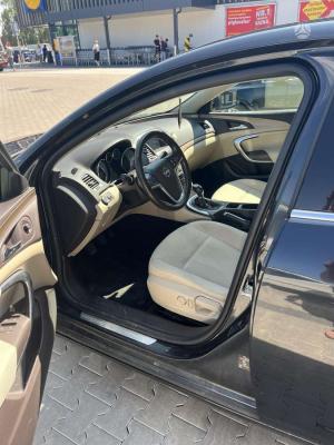 Black Opel Insignia 2012 in Kaunas, with an engine capacity of 2.00 L and mileage of 300 thousand km for 2990 €, photo 10 on AUTOMOTO.COM.LV