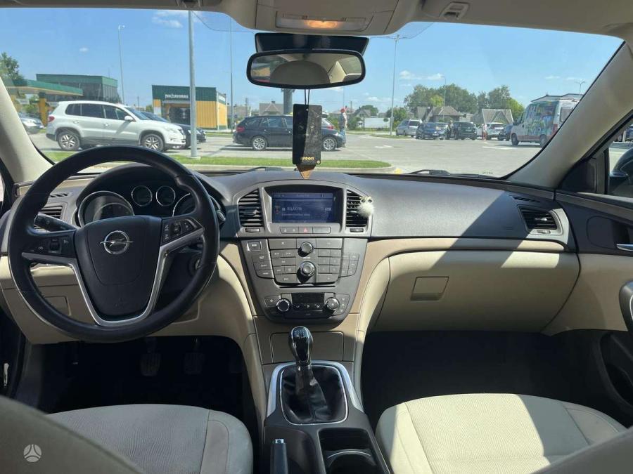 Black Opel Insignia 2012 in Kaunas, with an engine capacity of 2.00 L and mileage of 300 thousand km for 2990 €, photo 11 on AUTOMOTO.COM.LV