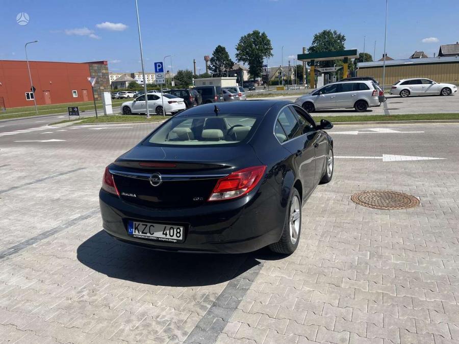 Black Opel Insignia 2012 in Kaunas, with an engine capacity of 2.00 L and mileage of 300 thousand km for 2990 €, photo 17 on AUTOMOTO.COM.LV