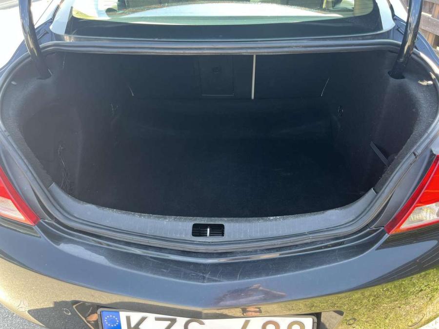 Black Opel Insignia 2012 in Kaunas, with an engine capacity of 2.00 L and mileage of 300 thousand km for 2990 €, photo 18 on AUTOMOTO.COM.LV