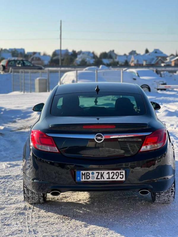 Black Opel Insignia 2013 in Klaipeda, with an engine capacity of 1.96 L and mileage of 276 thousand km for 4300 €, photo 7 on AUTOMOTO.COM.LV