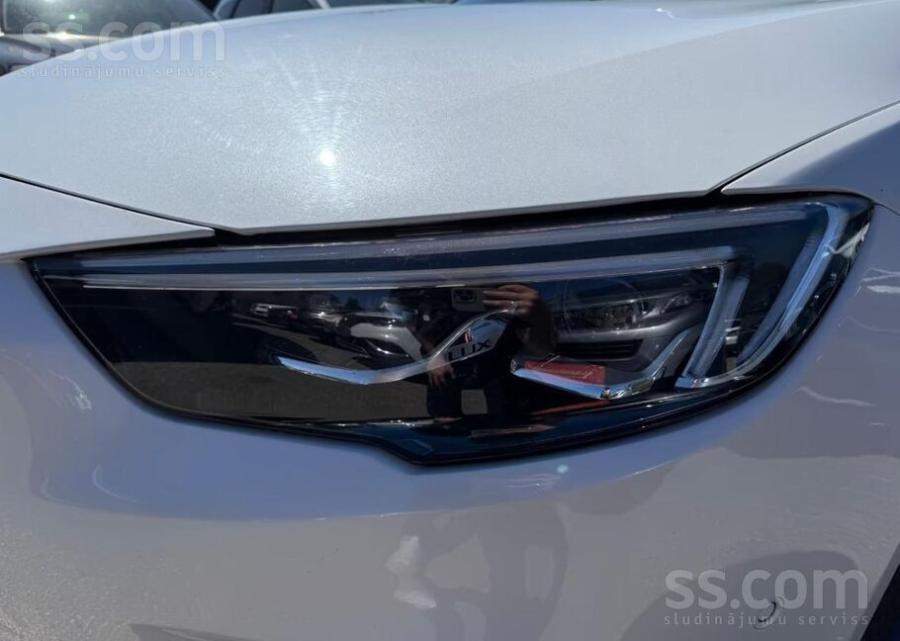 Black Opel Insignia 2020 in Jurmala, with an engine capacity of 2.00 L and mileage of 159 thousand km for 15500 €, photo 24 on AUTOMOTO.COM.LV