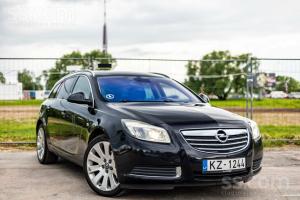 Black Opel Insignia 2009 in Riga, with an engine capacity of 2.00 L and mileage of 331 thousand km for 4990 €, photo 2 on AUTOMOTO.COM.LV