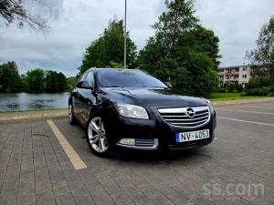 Black Opel Insignia 2009 in Riga, with an engine capacity of 2.00 L and mileage of 281 thousand km for 4800 €, photo 10 on AUTOMOTO.COM.LV