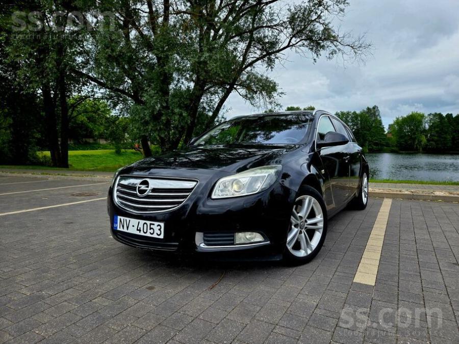 Black Opel Insignia 2009 in Riga, with an engine capacity of 2.00 L and mileage of 281 thousand km for 4800 €, photo 11 on AUTOMOTO.COM.LV