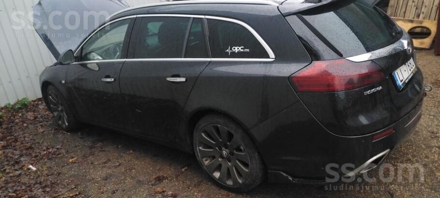 Black Opel Insignia 2009 in Riga, with an engine capacity of 2.00 L and mileage of 369 thousand km for 3500 €, photo 5 on AUTOMOTO.COM.LV