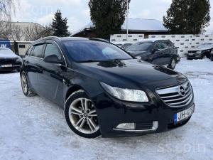 Black Opel Insignia 2009 in Riga, with an engine capacity of 2.00 L and mileage of 0 thousand km for 3990 €, photo 2 on AUTOMOTO.COM.LV
