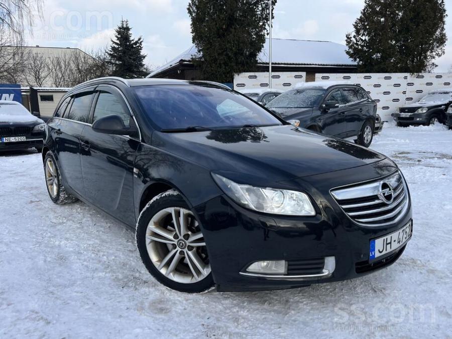 Black Opel Insignia 2009 in Riga, with an engine capacity of 2.00 L and mileage of 0 thousand km for 3990 €, photo 2 on AUTOMOTO.COM.LV
