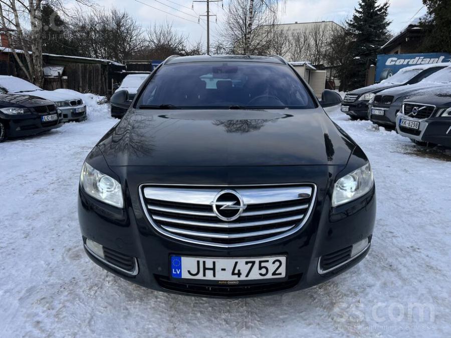Black Opel Insignia 2009 in Riga, with an engine capacity of 2.00 L and mileage of 0 thousand km for 3990 €, photo 3 on AUTOMOTO.COM.LV