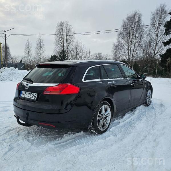 Melns Opel Insignia 2009 Rīga, ar dzinēja tilpumu 2.00 L un nobraukumu 285 tūkst. km par 2850 €, foto 4 vietnē AUTOMOTO.COM.LV