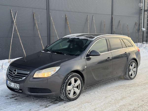 Black Opel Insignia 2009 in Vilnius, with an engine capacity of 1.96 L and mileage of 363 thousand km for 2402 €, photo 1 on AUTOMOTO.COM.LV