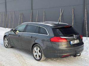 Black Opel Insignia 2009 in Vilnius, with an engine capacity of 1.96 L and mileage of 363 thousand km for 2402 €, photo 2 on AUTOMOTO.COM.LV