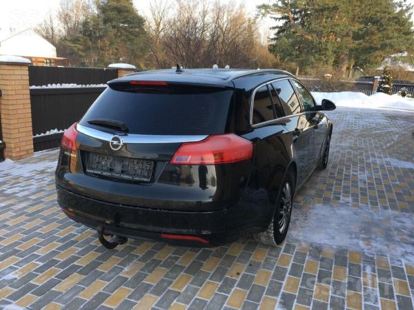 Black Opel Insignia 2009 in Riga, with an engine capacity of 1.80 L and mileage of 0 thousand km for 4500 €, photo 5 on AUTOMOTO.COM.LV