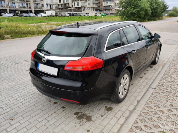Black Opel Insignia 2009 in Vilnius, with an engine capacity of 1.80 L and mileage of 220 thousand km for 2700 €, photo 5 on AUTOMOTO.COM.LV