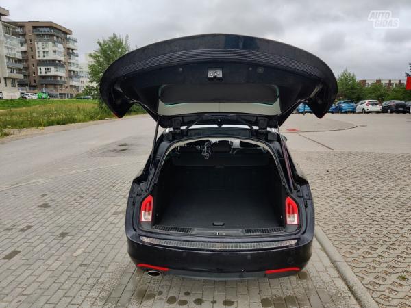 Black Opel Insignia 2009 in Vilnius, with an engine capacity of 1.80 L and mileage of 220 thousand km for 2700 €, photo 8 on AUTOMOTO.COM.LV