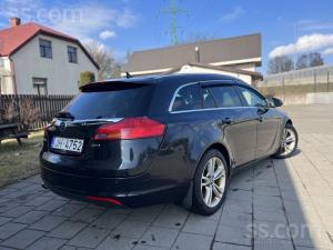 Black Opel Insignia 2009 in Riga, with an engine capacity of 2.00 L and mileage of 0 thousand km for 2490 €, photo 4 on AUTOMOTO.COM.LV