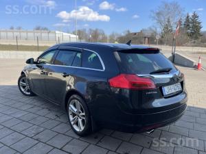 Black Opel Insignia 2009 in Riga, with an engine capacity of 2.00 L and mileage of 0 thousand km for 2490 €, photo 5 on AUTOMOTO.COM.LV