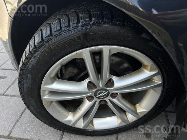 Black Opel Insignia 2009 in Riga, with an engine capacity of 2.00 L and mileage of 0 thousand km for 2490 €, photo 6 on AUTOMOTO.COM.LV