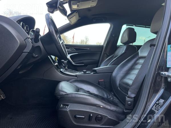 Black Opel Insignia 2009 in Riga, with an engine capacity of 2.00 L and mileage of 0 thousand km for 2490 €, photo 8 on AUTOMOTO.COM.LV