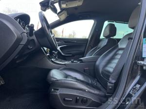 Black Opel Insignia 2009 in Riga, with an engine capacity of 2.00 L and mileage of 0 thousand km for 2490 €, photo 9 on AUTOMOTO.COM.LV
