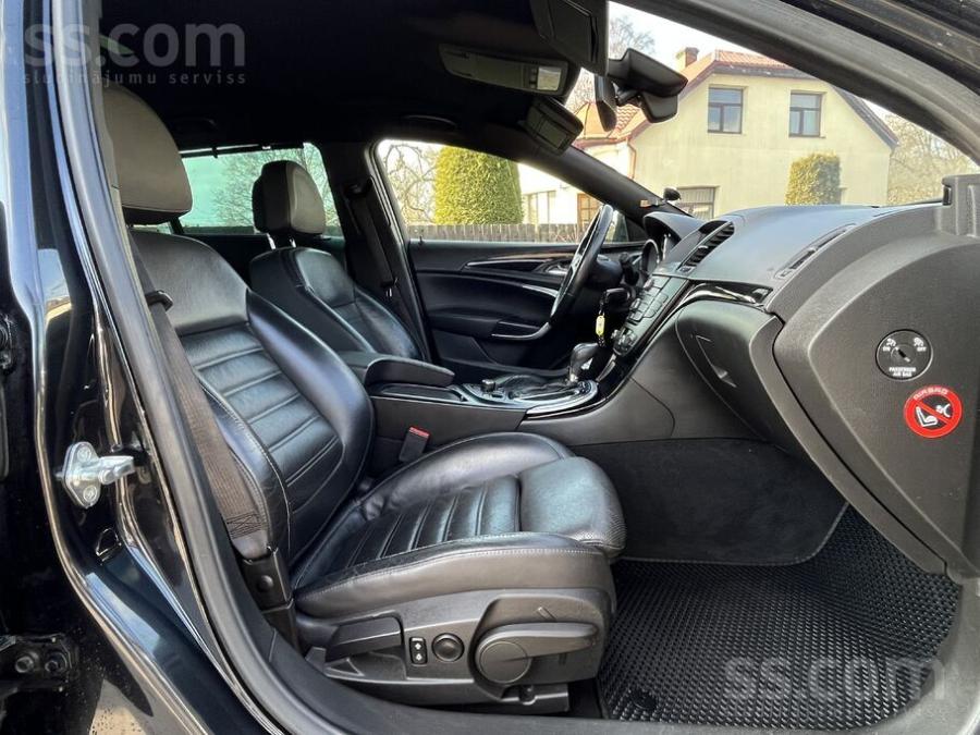 Black Opel Insignia 2009 in Riga, with an engine capacity of 2.00 L and mileage of 0 thousand km for 2490 €, photo 10 on AUTOMOTO.COM.LV
