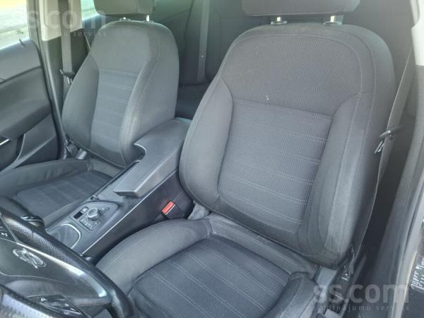 Black Opel Insignia 2009 in Talsi, with an engine capacity of 2.00 L and mileage of 244 thousand km for 3000 €, photo 8 on AUTOMOTO.COM.LV