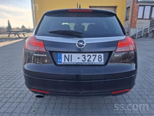 Black Opel Insignia 2009 in Talsi, with an engine capacity of 2.00 L and mileage of 244 thousand km for 3000 €, photo 5 on AUTOMOTO.COM.LV